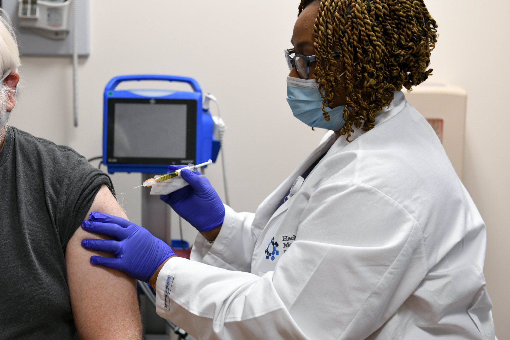 Should You Get a COVID Booster Shot? Our Doctor Explains